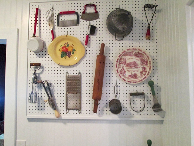 Kitchen gadgets that would baffle modern cooks hang proudly on display, celebrating the everyday ingenuity of Florida's beach dwellers.