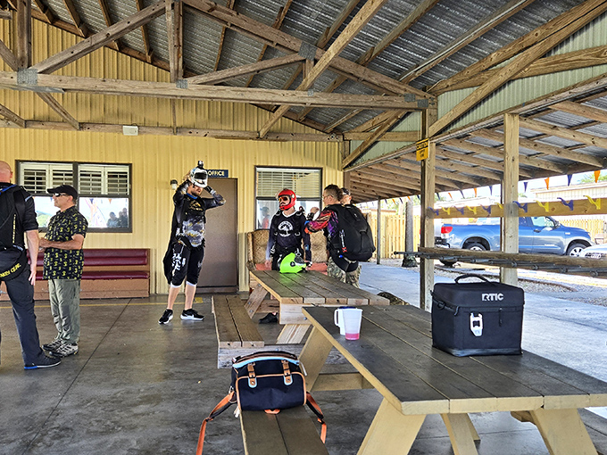 Gearing up under the hangar where professionals make strapping into a harness look as casual as putting on a jacket.