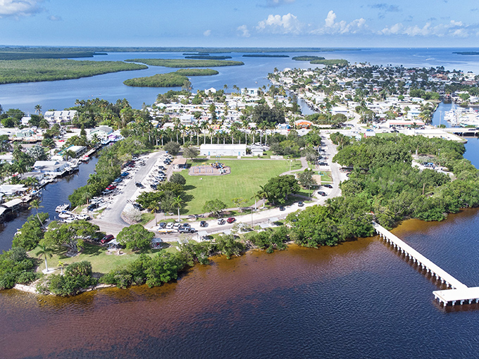 Matlacha's aerial view reveals a community surrounded by water, where canals and waterways define this unique island town.