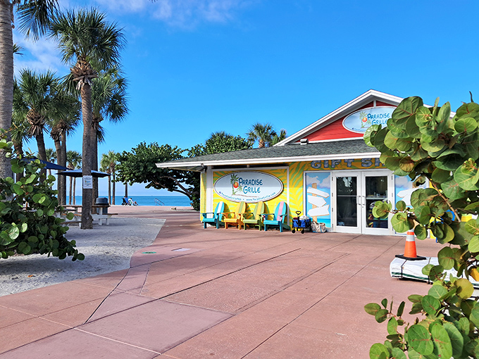 Paradise Grille's colorful beachfront building brings a cheerful vibe to Pass-a-Grille Beach's pristine shoreline.