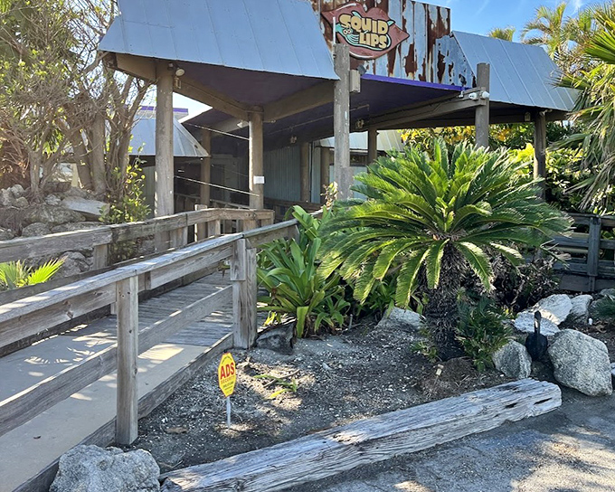 Squid Lips' weathered wood and thatched roof create the perfect Old Florida atmosphere for waterfront dining.