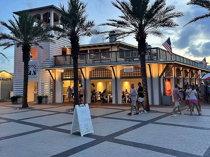 Classic coastal elegance defines this Seaside landmark, where palm trees frame your perfect evening escape above the beach crowds.