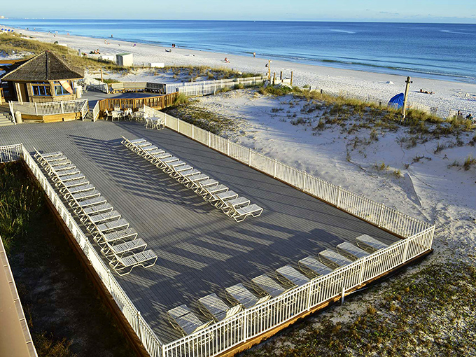 Emerald waters meet pristine white sand at this Destin beach, where rows of inviting loungers await sun-seekers and wave-watchers.