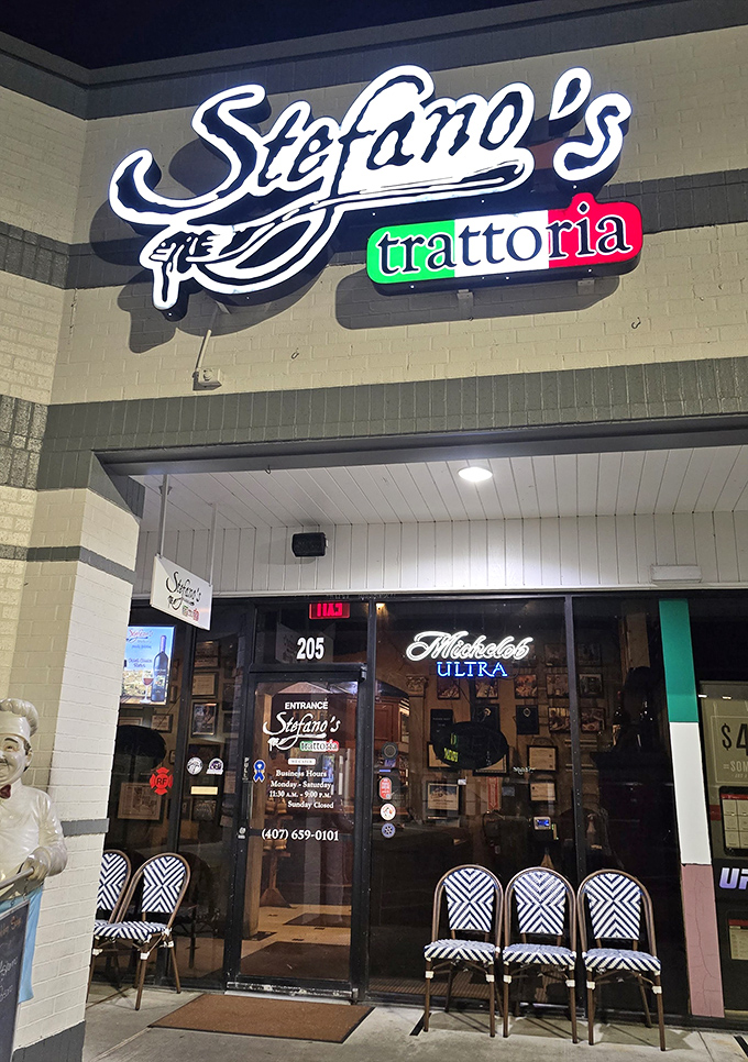 The welcoming entrance to Stefano's features comfortable outdoor seating. This family-owned trattoria serves authentic Italian cuisine that would make any nonna proud.