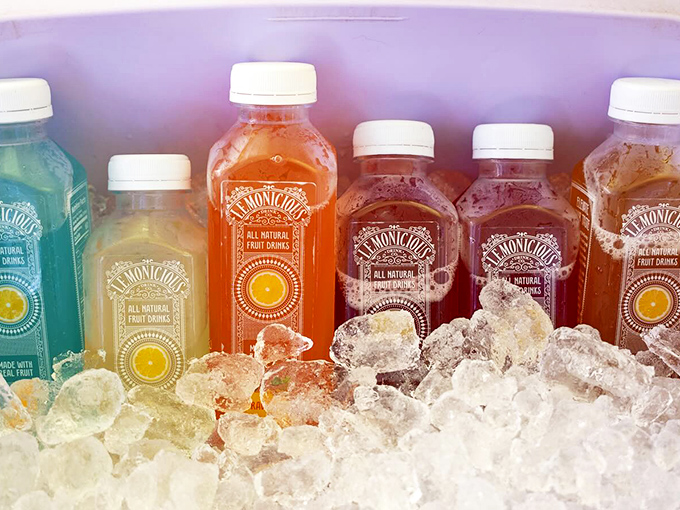 Colorful bottles of all-natural juices nestle in ice, promising refreshment that tastes like Florida sunshine in liquid form.