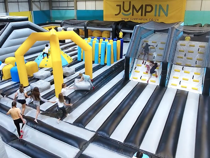 Inflatable slides transform the simple act of descending into a gravity-powered thrill ride that ends with inevitable laughter.