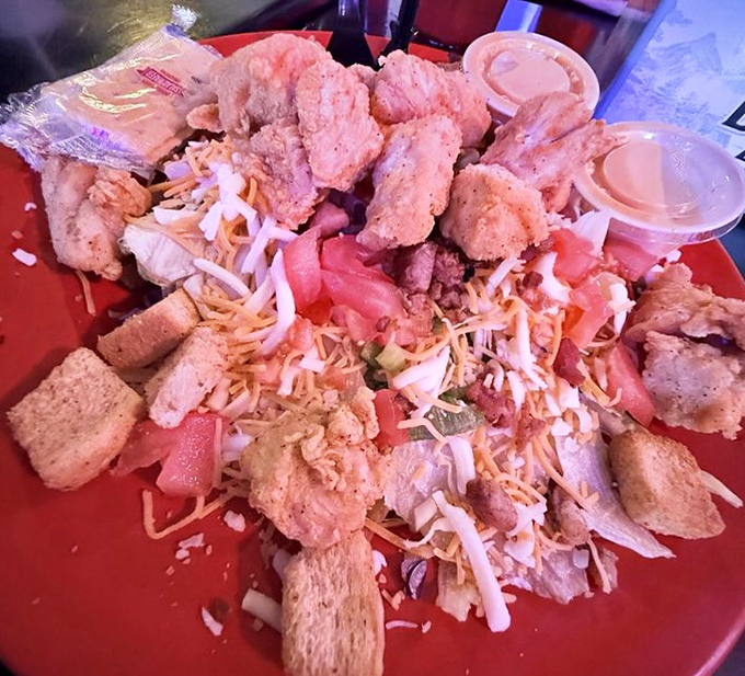 A protein-packed festival of flavors that lets you pretend you're eating healthy. The croutons are like little flavor rafts in a sea of freshness.