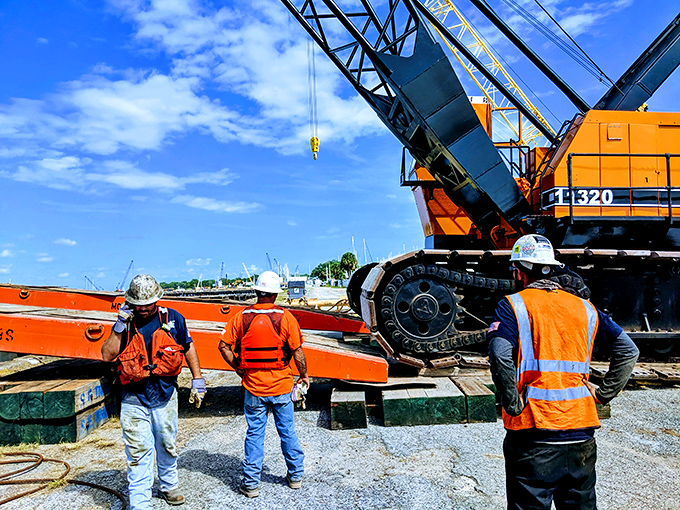 Construction equipment nearby hints at the herculean effort required to transport and position this massive artifact. Moving a space tank isn't exactly like rearranging living room furniture.