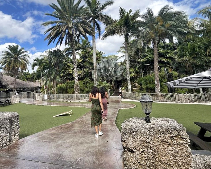The natural coral rock pathways lead visitors through gardens that showcase South Florida's native and exotic plant species.