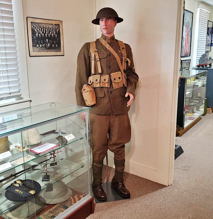 The WWI doughboy uniform represents an era when soldiers faced unimaginable trench warfare conditions, making your worst Monday morning commute look like a vacation.