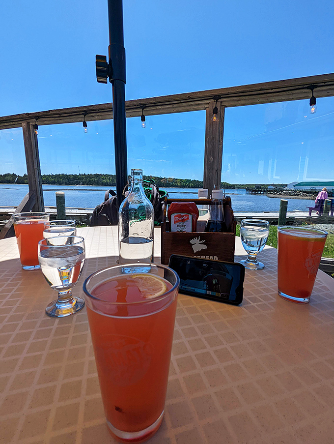 Colorful cocktails complement the waterfront setting, each sip offering a refreshing counterpoint to the salty sea breeze.