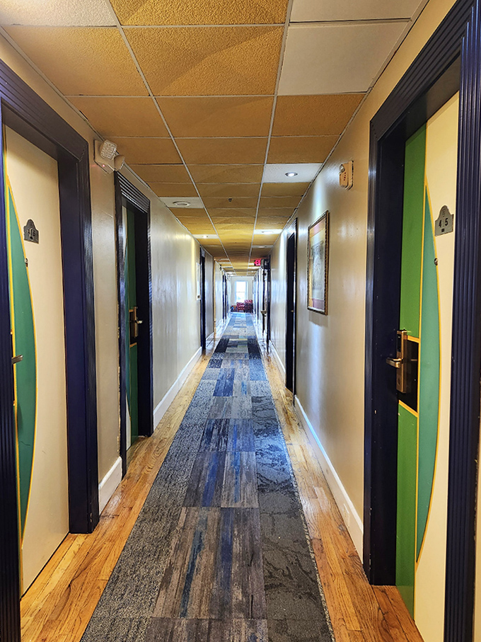 This hallway has witnessed decades of late-night returns, whispered conversations, and suitcase wheels. Its wooden floors have stories that would make your gossip group blush.