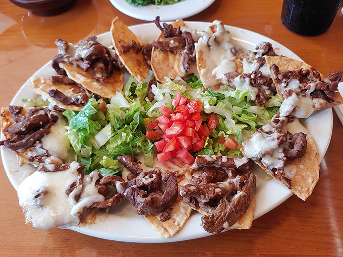 Nachos El Ranchito &ndash; where crispy meets melty in a delicious standoff that nobody loses, especially not your taste buds.