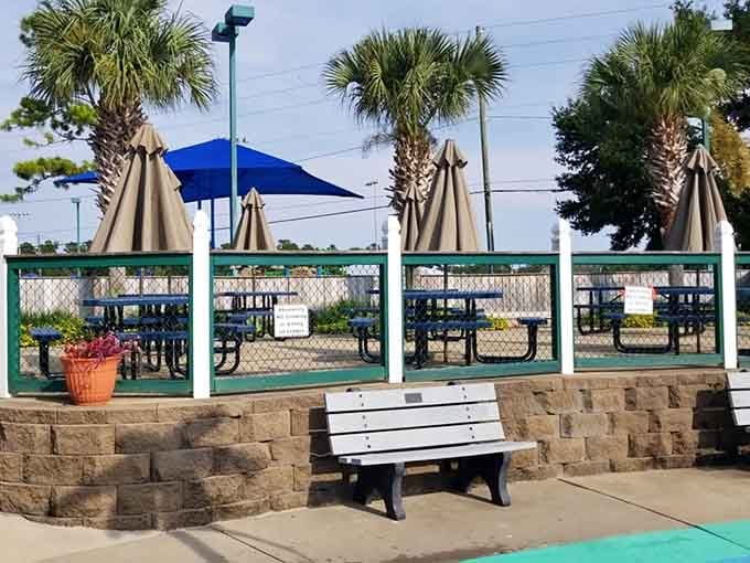 Shaded seating where parents can rest their weary bones while pretending they're still paying attention to every single thing their kids do.
