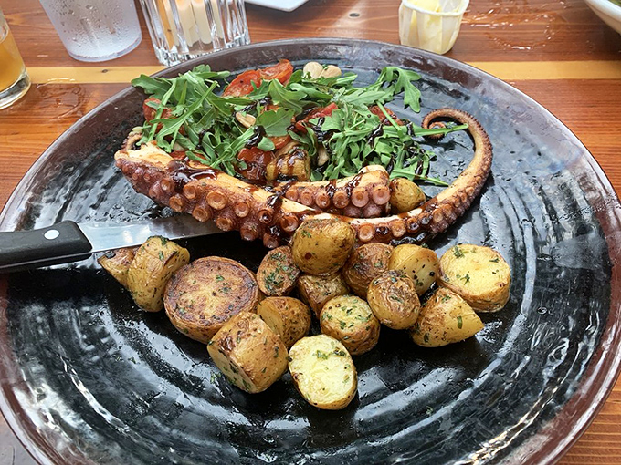 This grilled octopus could convert the most dedicated tentacle-skeptic with its perfect char and tender interior.