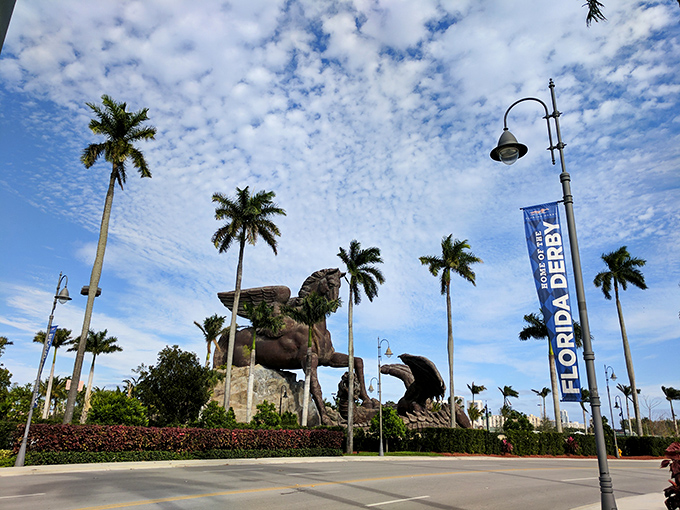 Florida's famous sunshine creates dramatic shadows across the sculpture, highlighting every meticulously crafted detail of this bronze behemoth.