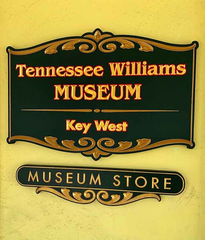 The museum's elegant signage welcomes visitors to explore the legacy of a playwright who found his creative home in Key West's laid-back, accepting atmosphere.