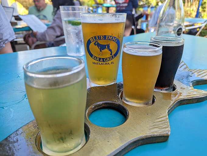 A flight of local craft beers served on a wooden paddle &ndash; the perfect companion to a seafood feast.