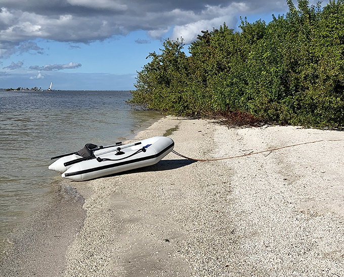 A small inflatable boat rests on virgin shores &ndash; your ticket to exploring hidden coves that Instagram influencers haven't discovered yet.