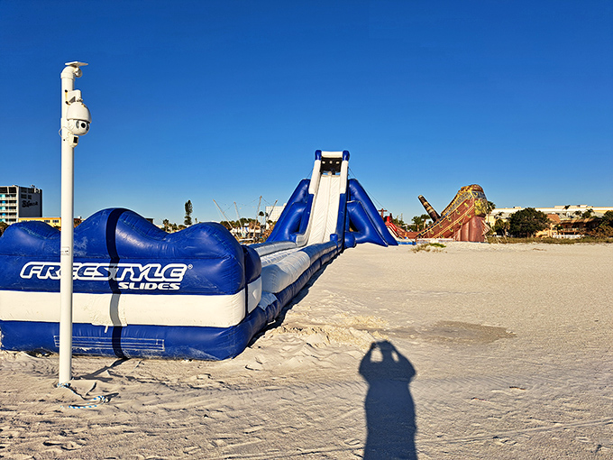 An inflatable water slide brings childhood joy to the shoreline, proving Treasure Island offers fun for sun-seekers of every age.