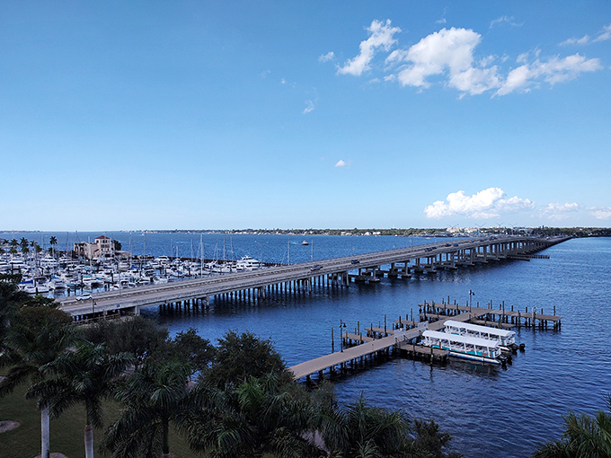 A bridge stretches across blue waters, connecting people to places and photographers to their next perfect shot.