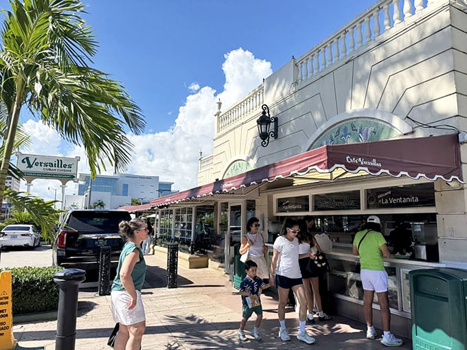 Versailles' elegant white exterior with its distinctive awnings stands as the cultural heart of Miami's Cuban community.