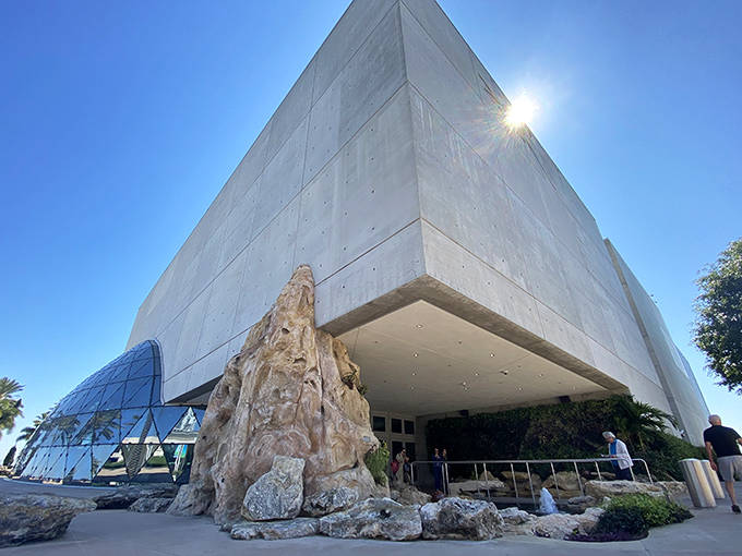 Sunlight plays across the angular concrete exterior of the Dali Museum, creating shadows as surreal as the art inside.