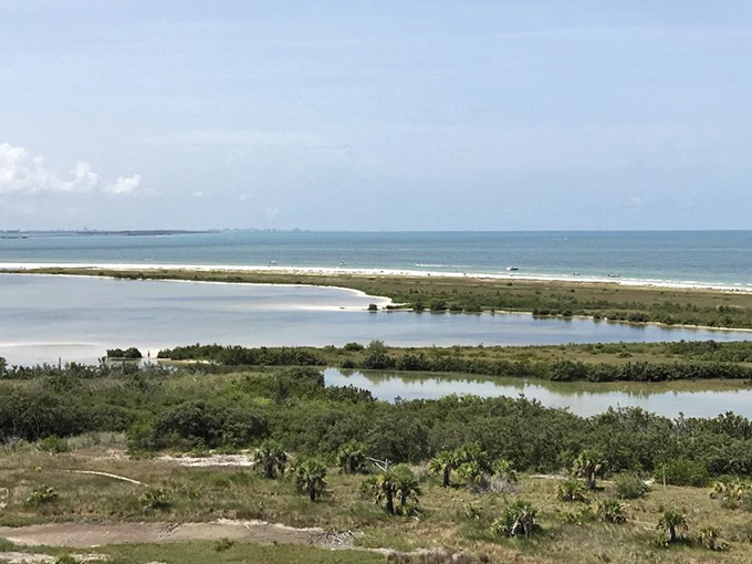 Beach View: From this vantage point, the lighthouse stands guard over waters so blue they make the Caribbean look like it needs a color boost.