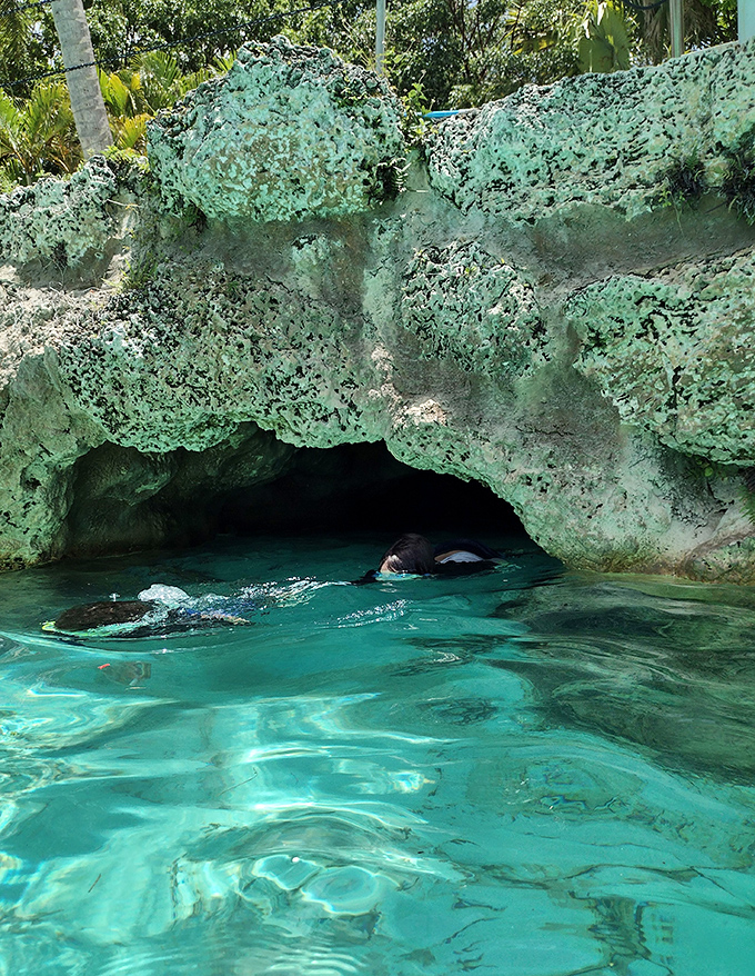 Nature's own secret passage: The limestone caves offer cool refuge and underwater adventures for the young and young-at-heart.