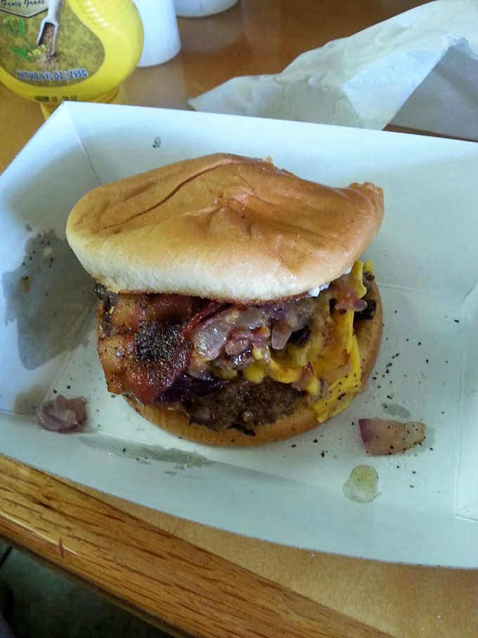 A testament to burger purity&mdash;fresh beef, melted cheese, and toppings in perfect proportion on a properly toasted bun. No Instagram filters needed.