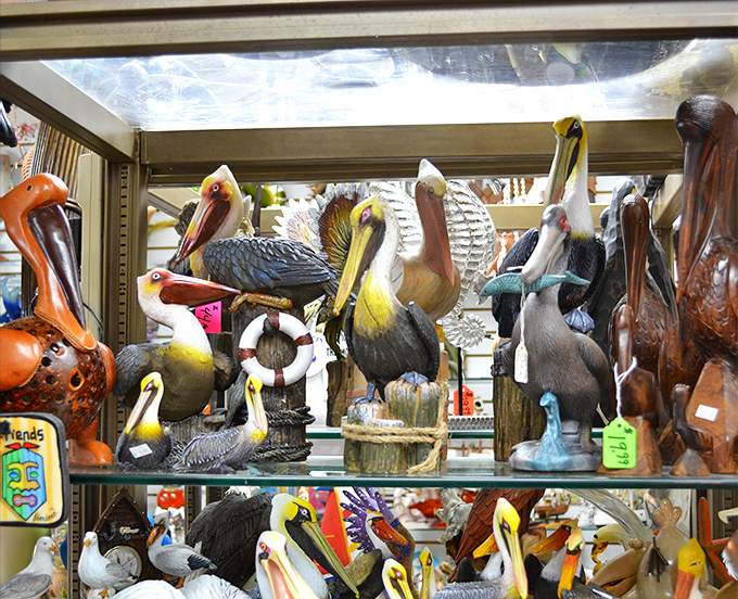 A flock of pelican figurines stands at attention, showcasing Florida's beloved coastal bird in every imaginable material and pose.