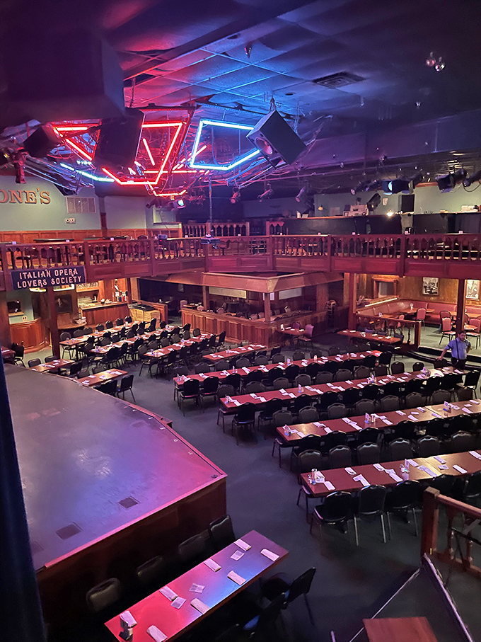 The multi-level dining area creates an intimate atmosphere where every table feels like you've got the best seat in the joint.