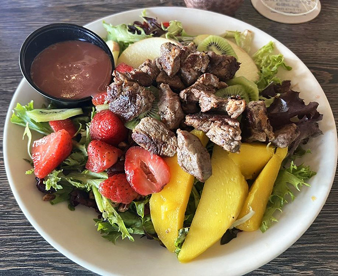 Who says salads can't be exciting? This protein-packed beauty combines tender steak with fresh fruit for a refreshing meal.