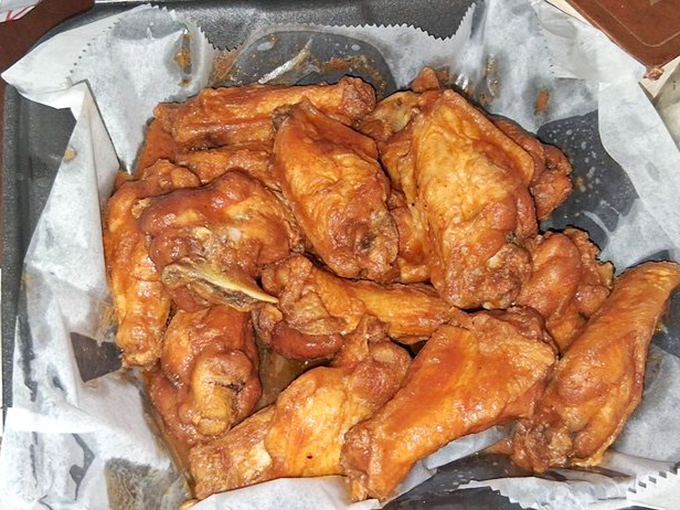 These sweet-smoky wings glisten with sauce that strikes the perfect balance between backyard barbecue and gourmet indulgence. Finger-licking isn't just allowed—it's required.