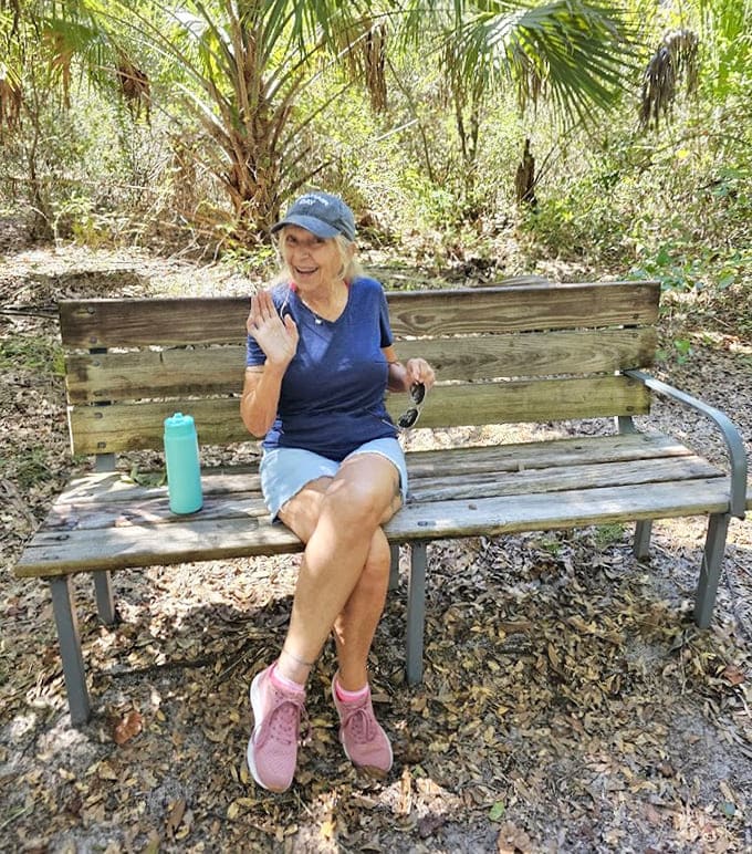 Sometimes the best seat in the house is a weathered bench under the trees, where doing absolutely nothing becomes an art form worth mastering.