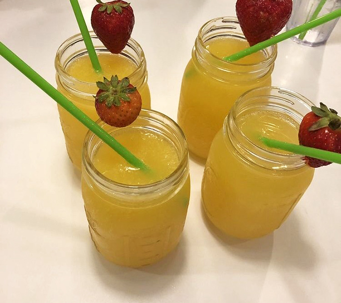 Mimosas garnished with strawberries&mdash;because vitamin C is important, and sometimes breakfast needs a little sparkle to match the Florida sunshine.