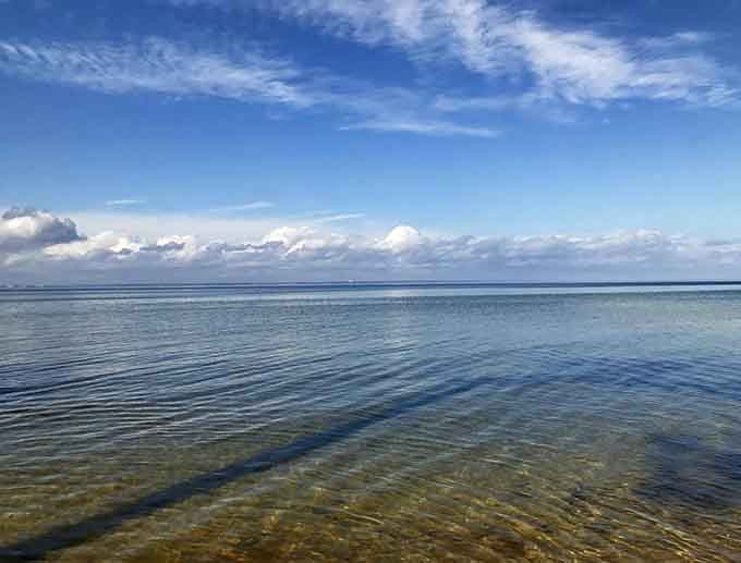 Water so clear and calm it looks like someone Photoshopped the ripples out, but nope, it's just that perfect.