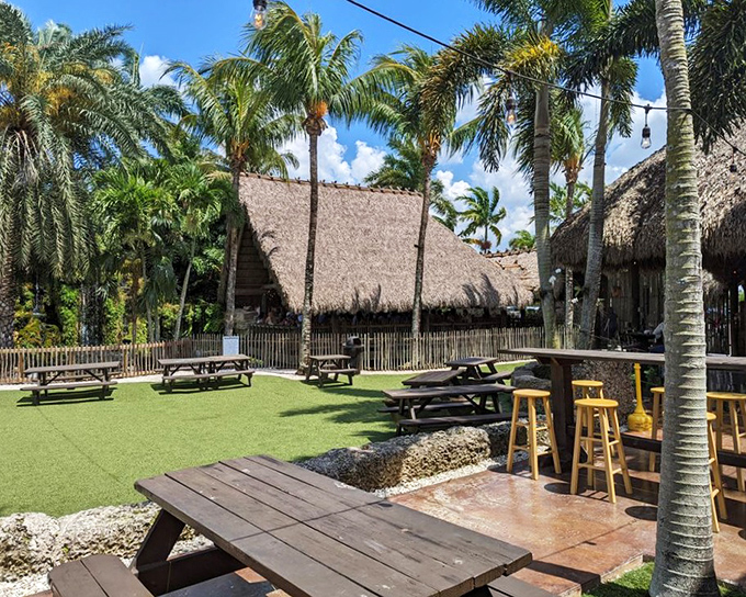 Outdoor seating areas invite visitors to relax and enjoy the tropical surroundings while sipping on exotic fruit wines.