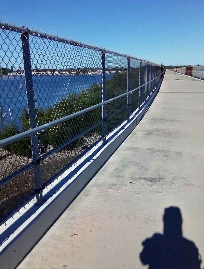 Bridges curve gracefully over waterways, offering views that justify stopping for photos even though you've already taken seventeen similar shots today.