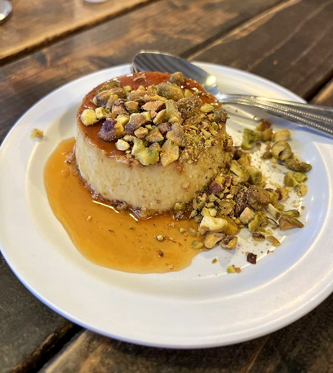 Pistachio flan topped with crushed nuts creates textural magic&mdash;sophisticated enough for date night, comforting enough for a solo treat-yourself moment.