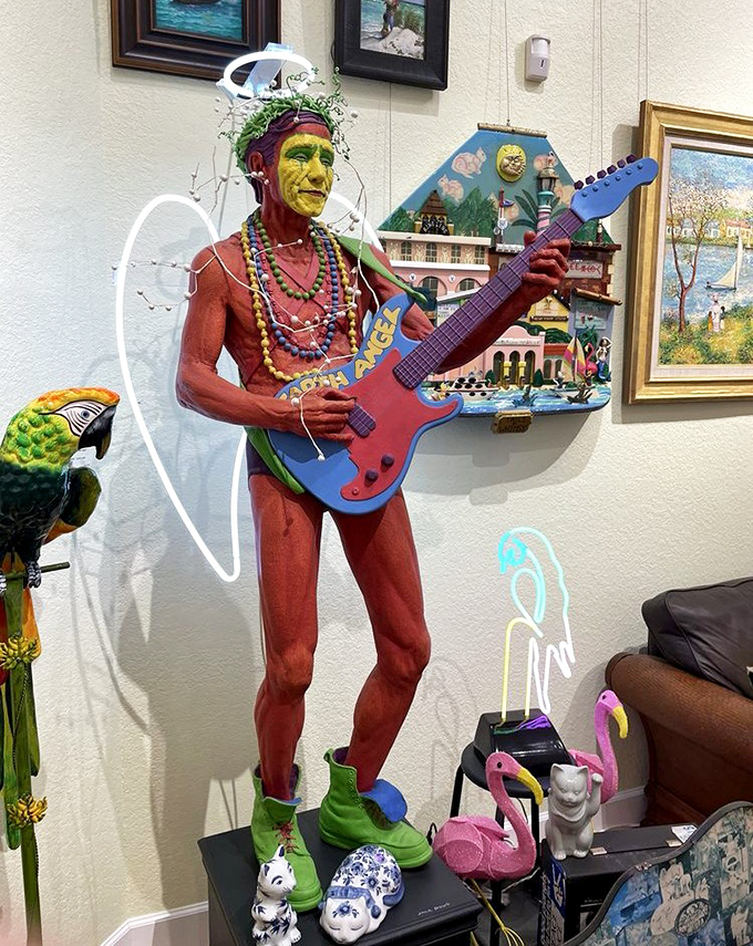 This musical figure with electric guitar and angel wings looks ready to start a heavenly rock concert&mdash;the kind where even the clouds would dance.