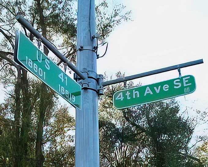 Street signs mark the intersection where history and present day meet, guiding visitors to this hidden gem of Florida heritage.