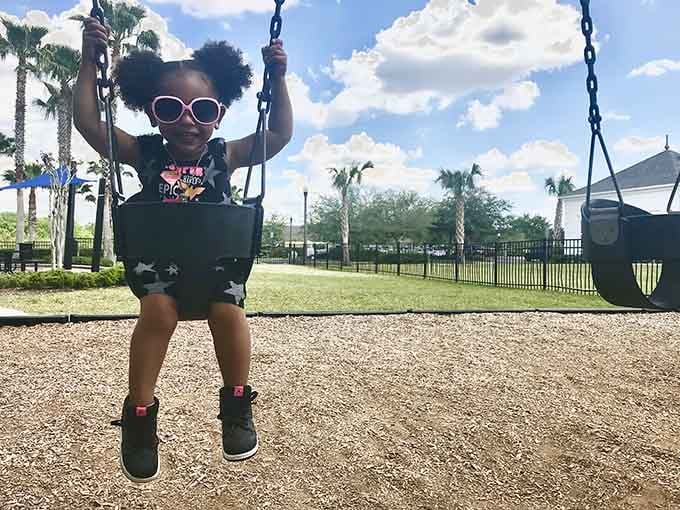 Swings carry young adventurers skyward, their laughter mixing with birdsong to create the perfect soundtrack for childhood memories.