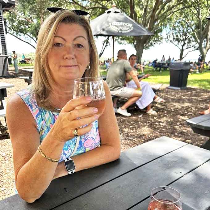 Outdoor seating under the shade of ancient oaks creates the perfect setting for sipping and savoring while soaking in vineyard views.