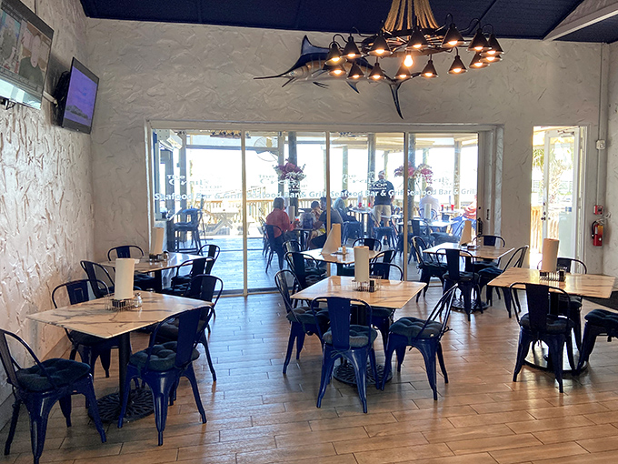 Simple elegance defines this dining space where natural light pours in, illuminating tables where seafood memories are made daily.