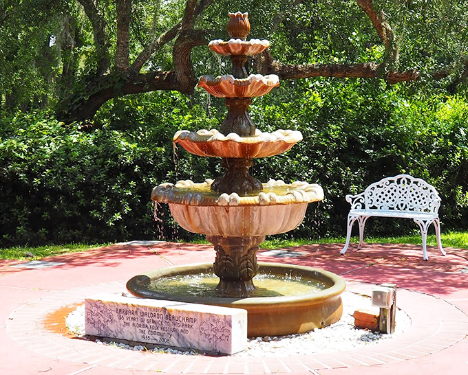 This ornate fountain offers a moment of tranquility, its gentle splashing adding another note to the park's natural symphony.