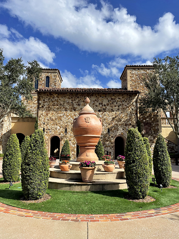 This elegant fountain courtyard creates the perfect backdrop for pretending you're a character in a romantic Italian film rather than someone avoiding yard work.