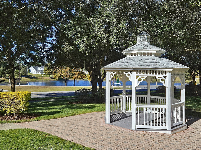 The white gazebo stands like a romantic novel cover come to life, hosting everything from quiet contemplation to impromptu wedding proposals.