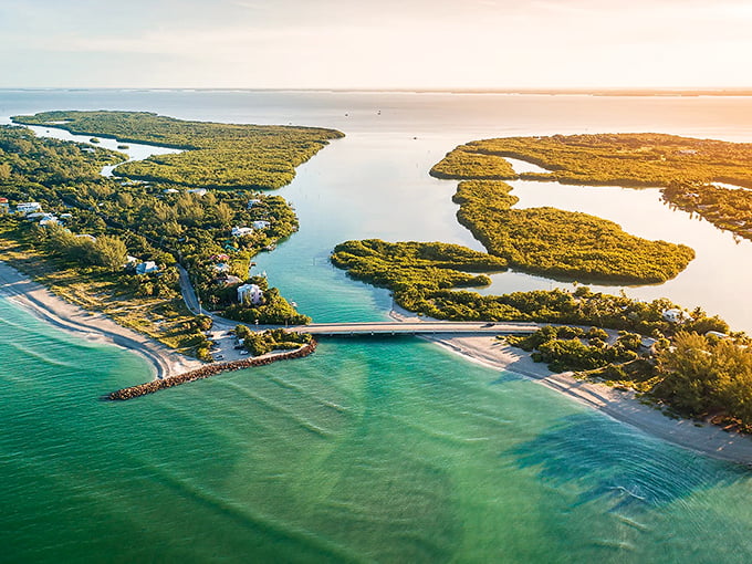 Captiva Island's winding waterways embrace lush green islands like arms cradling precious jewels, creating a paradise where land and sea dance together.
