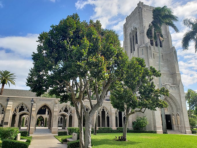 The Church of Bethesda-by-the-Sea stands like a medieval mirage among Palm Beach palms, Gothic grandeur meets tropical paradise in perfect harmony.